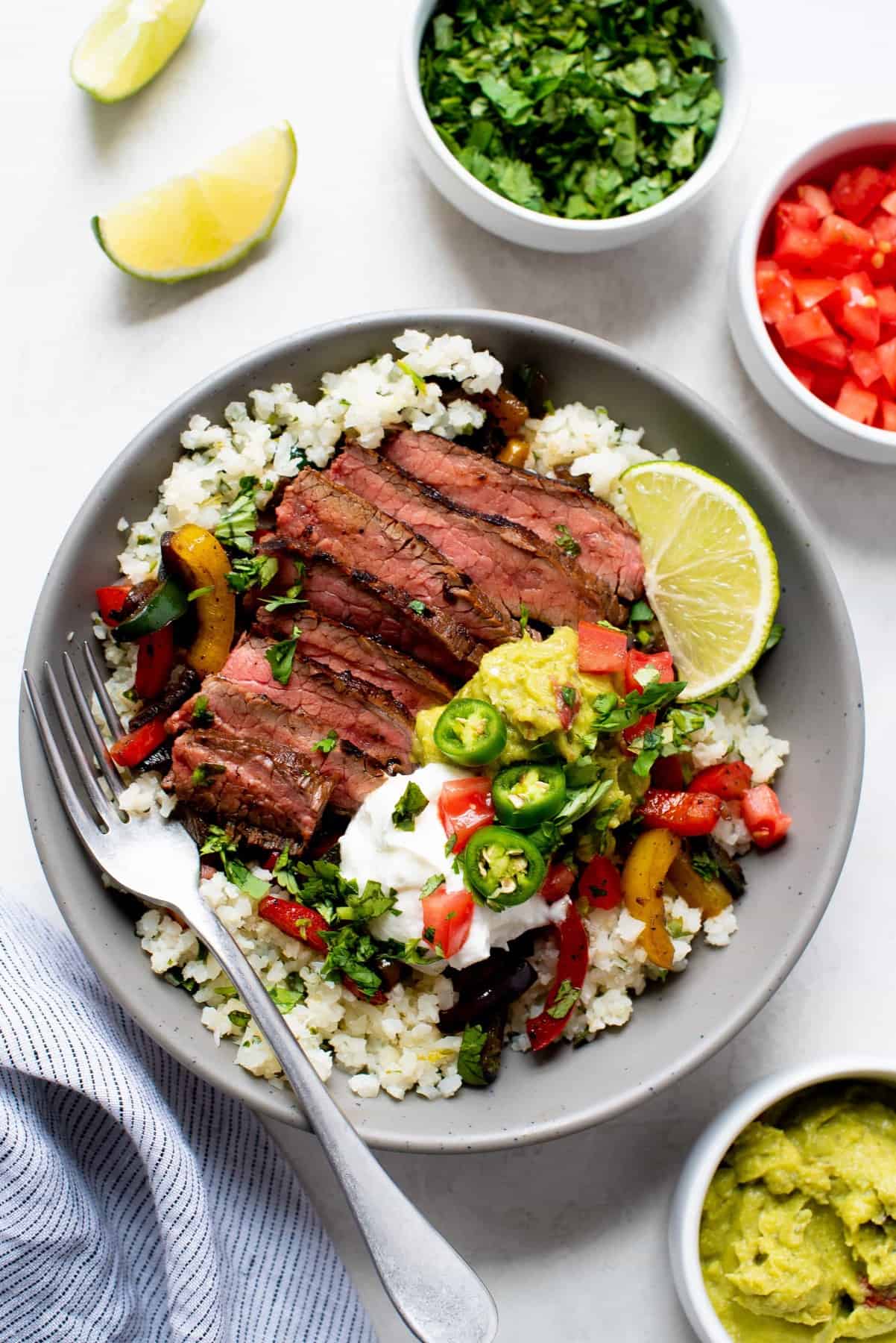 Steak Fajita Bowls With Cilantro Lime Cauliflower Rice Wholefully Steak Fajita Bowls With Cilantro Lime Cauliflower Rice Wholefully